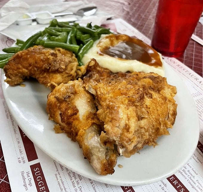 Fried chicken that would make Colonel Sanders question his life choices. Crispy, juicy, and served with sides that aren't afterthoughts.