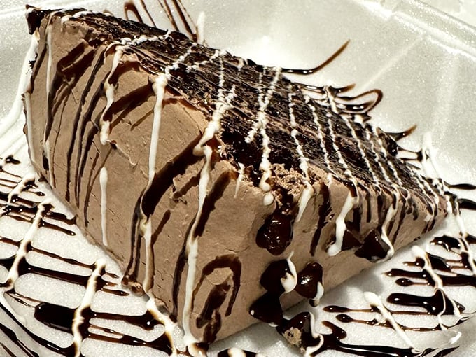 Chocolate cake that doesn't just end a meal—it provides closure, satisfaction, and a compelling reason to schedule your next visit.