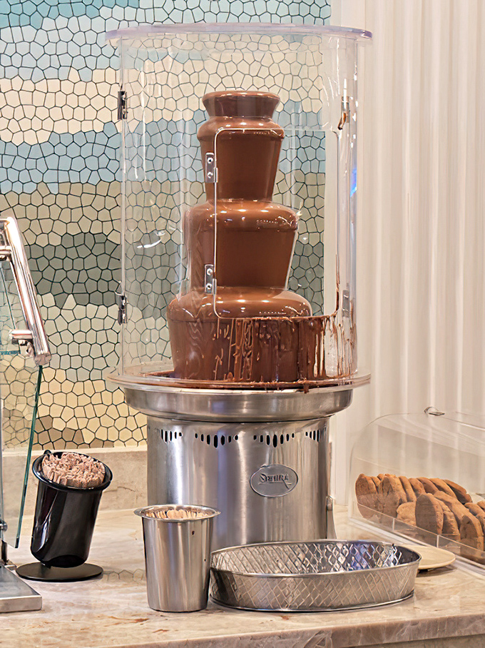 The chocolate fountain: where adults can experience the same joy kids feel at Christmas morning. Suddenly, strawberries are just delivery vehicles.