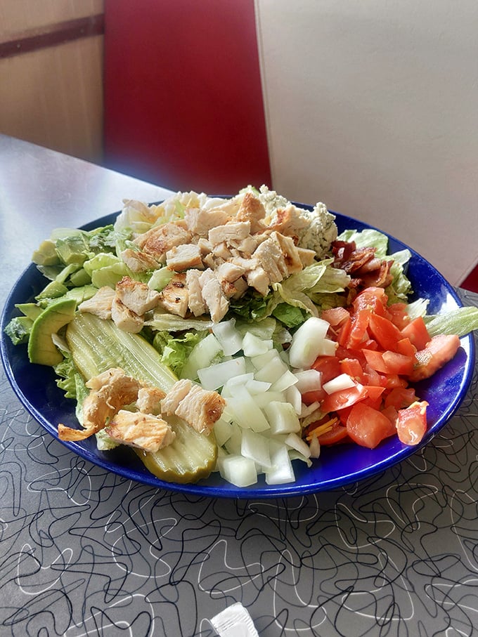 This isn't just a salad – it's a colorful rebellion against boring lunches, where every ingredient is arranged with the care of a still-life painting.