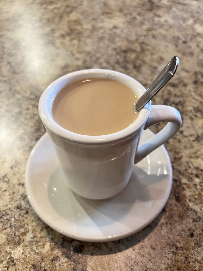 That first sip of diner coffee – hot, strong, and reliable. It's not fancy, doesn't have an Italian name, but it gets the job done like a trusted friend.