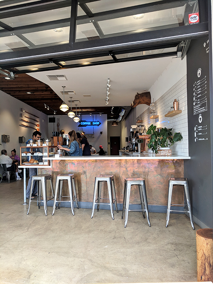 This isn't just another coffee counter—it's command central for caffeine emergencies and morning salvation in industrial-chic surroundings.