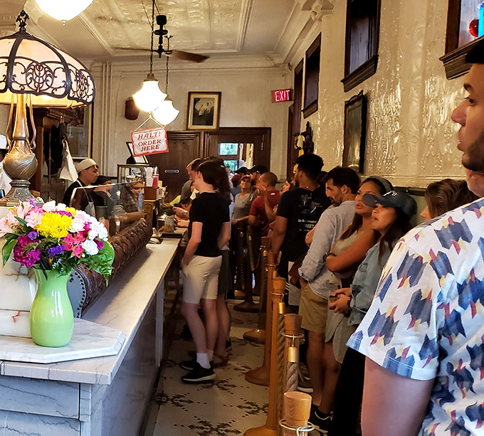 The line isn't a deterrent—it's part of the experience. These customers aren't just waiting; they're participating in a ritual of anticipation.
