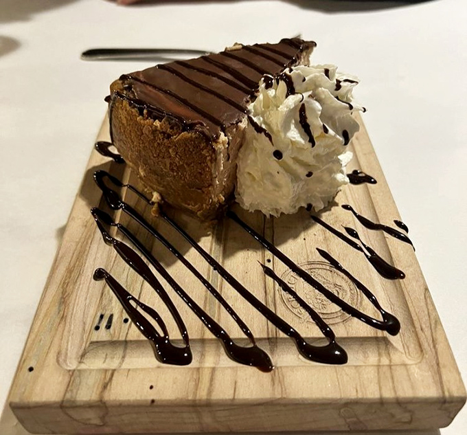 Chocolate perfection on a wooden board—because dessert this good deserves its own stage. The kind of sweet finale that makes you forget all your promises about "just having a bite."