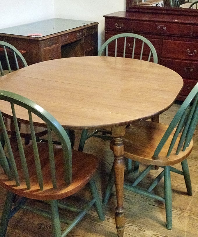 Family dinners waiting to happen around this solid wood table with mint-green chairs – just add your own heated political discussions and meatloaf.
