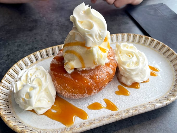 Not just a donut – it's a sugary life raft in a sea of responsibility, topped with enough whipped cream to make your inner child high-five you.