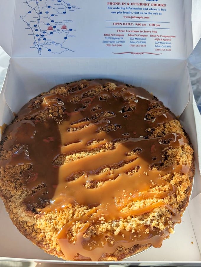The Dutch Caramel Apple Pie in its to-go box—because the only thing better than pie now is knowing you've got pie for later.