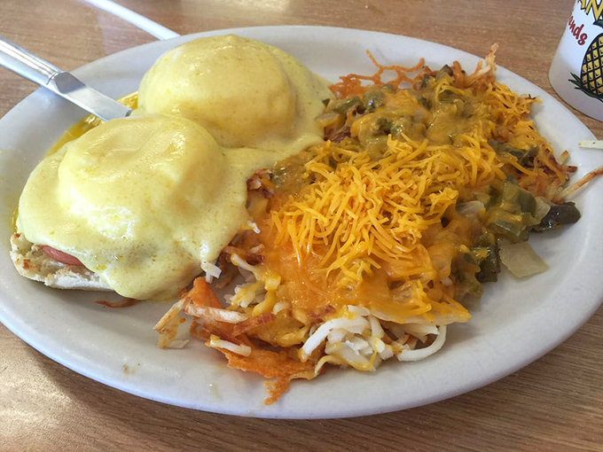 Eggs Benedict that would make the Pope jealous. Hollandaise sauce cascading over English muffins like a yellow waterfall of happiness.