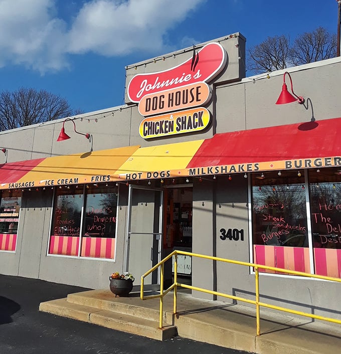 The yellow handrail leads to a promised land of hot dogs and fried chicken – a pilgrimage site for comfort food devotees.
