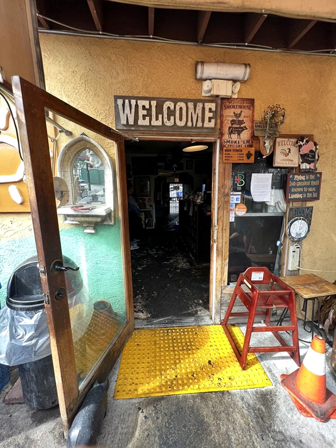 The "Welcome" sign isn't just polite—it's a promise that you're about to join a community that understands the sacred relationship between smoke and meat. 