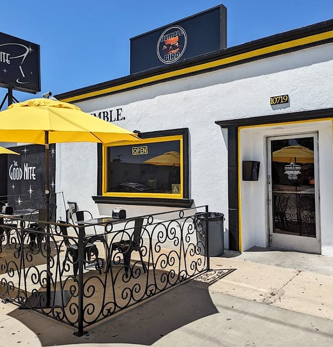 The entrance to chicken paradise—simple, unassuming, and marked by that signature yellow trim that signals you've arrived somewhere special. 