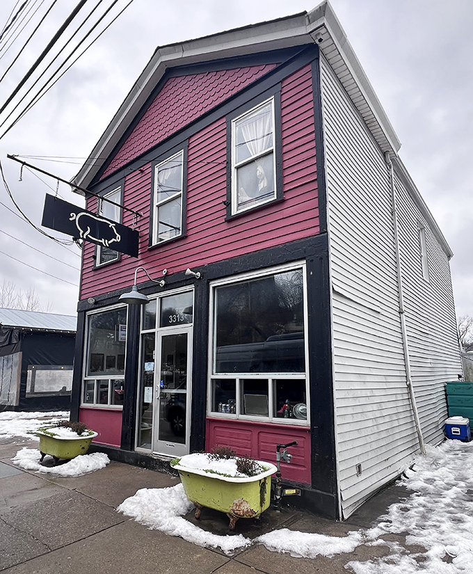 The unassuming exterior of Eli's original location – proof that the best food often hides in buildings your GPS might make you drive past twice.
