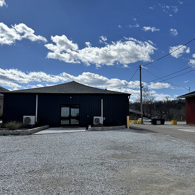 Simple buildings often house extraordinary experiences—this unassuming structure might just contain the meal that makes you text your friends: "You won't believe what I just found."