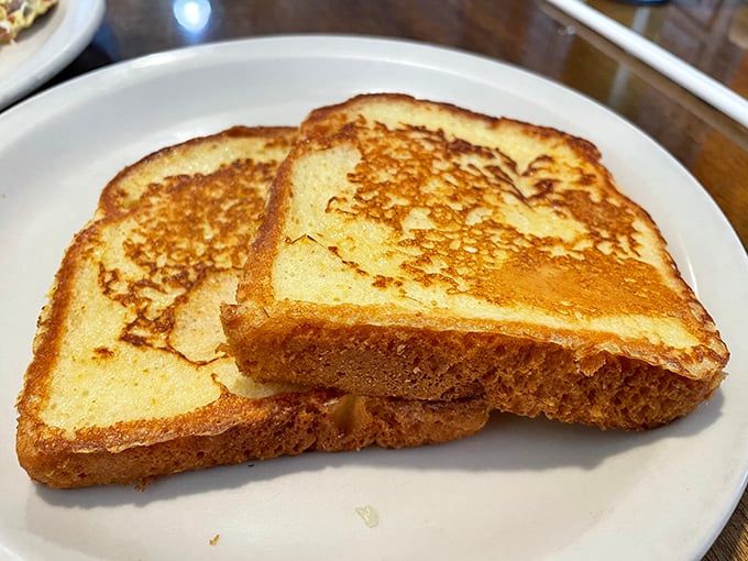 French toast that's achieved the perfect golden-brown exterior while maintaining that custard-like interior – the breakfast equivalent of striking gold.