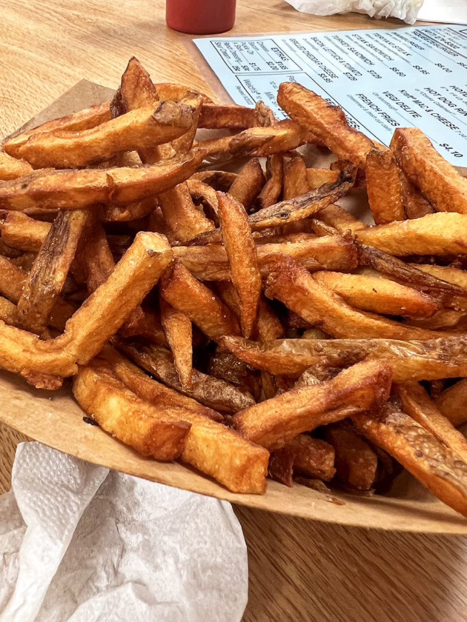 These hand-cut fries aren't just a side—they're co-stars. Golden, crispy exteriors giving way to fluffy centers—the perfect companion to that legendary burger.