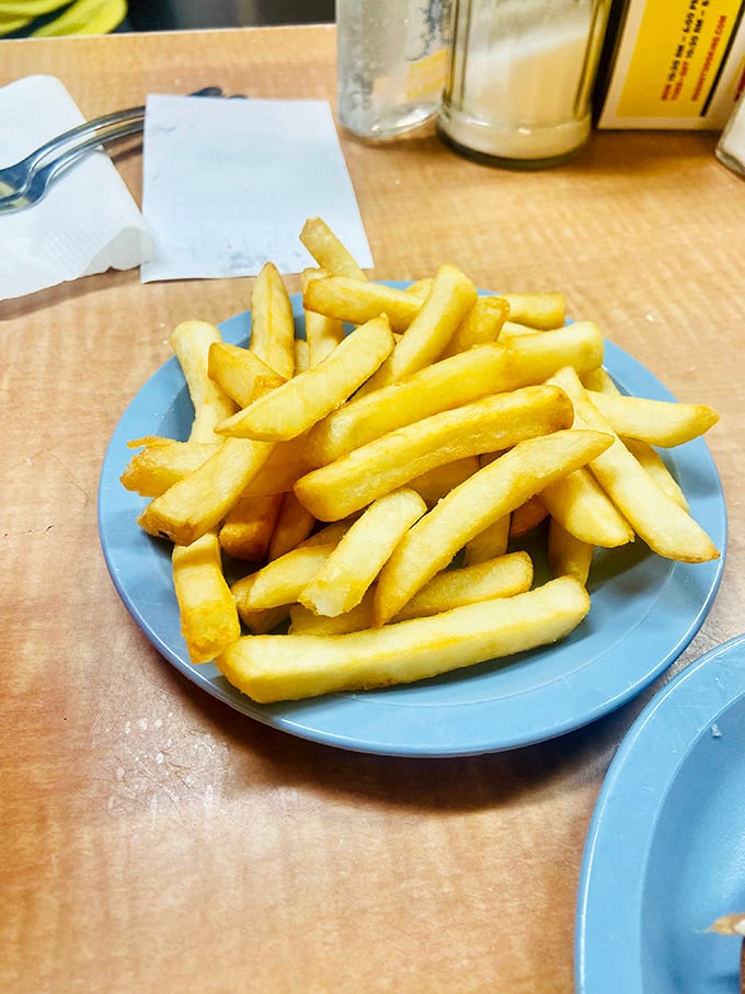 French fries done right—golden, crisp, and unpretentious. The perfect supporting cast member for the hot dog stars.