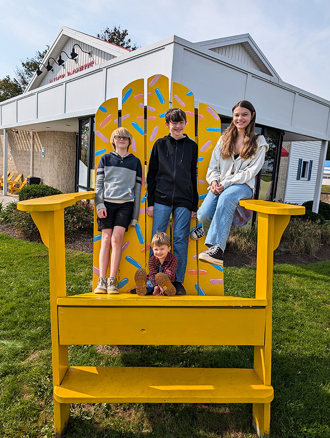 The giant yellow chair outside makes everyone feel like a kid again. It's not just a photo op – it's a portal back to childhood joy.