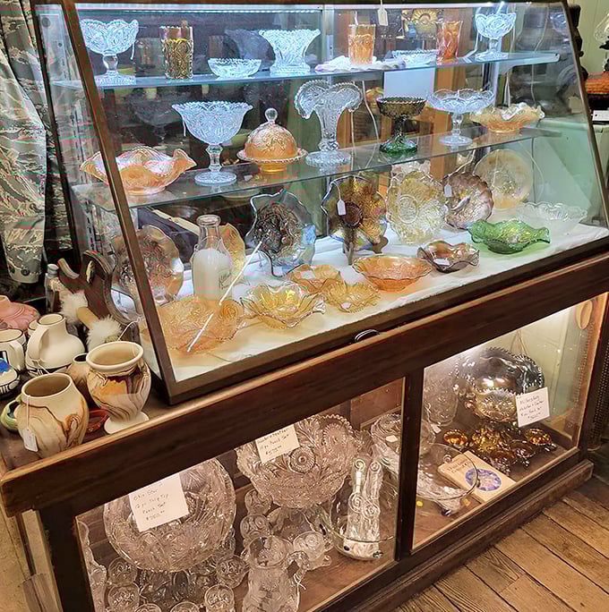 Depression glass catches the light like crystallized memories, each piece holding the reflections of dinner tables from generations past.