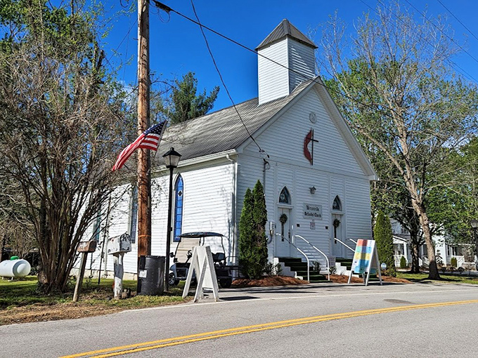 The white clapboard Methodist church stands as Granville's spiritual anchor – a timeless reminder of faith, community, and small-town values.