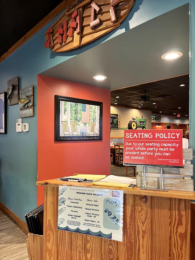 The entrance tells you everything—nautical décor, clear rules, and the promise of seafood worth waiting for.