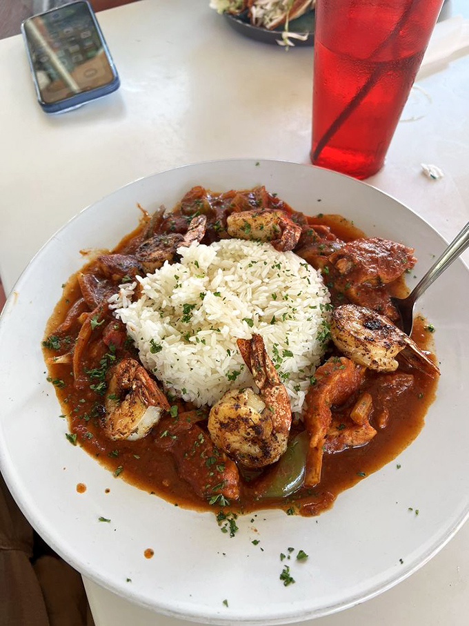 A hearty jambalaya with plump shrimp circling a perfect island of rice—comfort food that somehow feels right at home in the Florida heat.