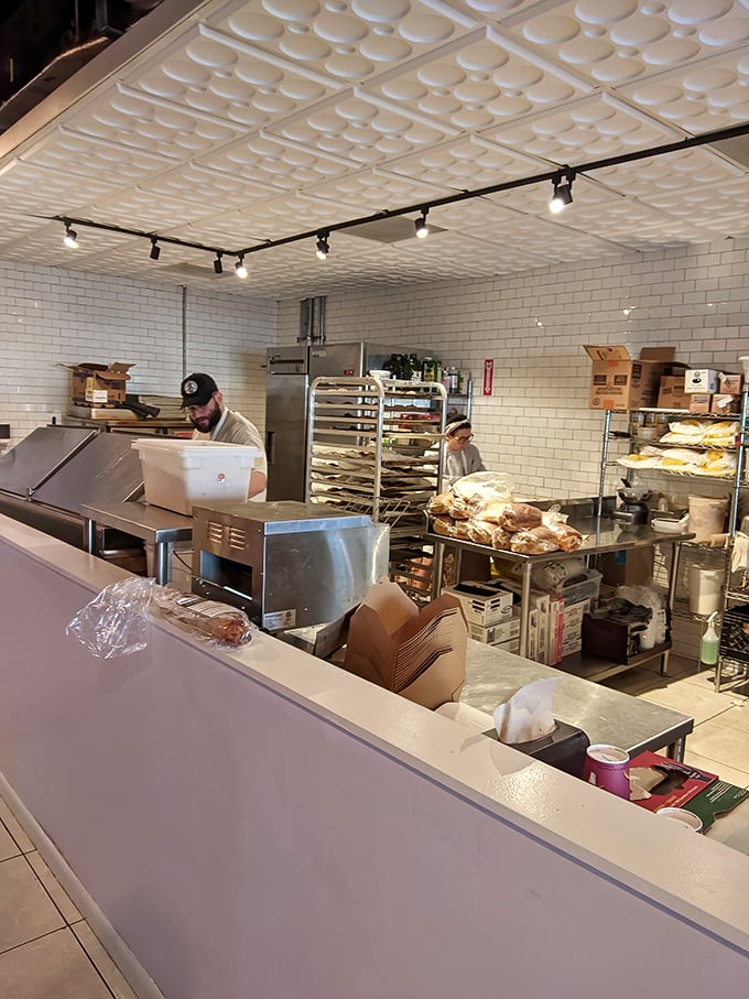 Behind the scenes, the bread-making sanctuary reveals itself—where patience, skill, and a well-maintained sourdough starter create edible magic daily.