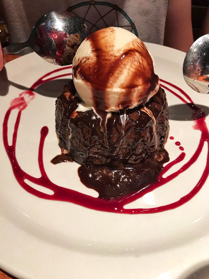 The chocolate lava cake doesn't just ooze—it performs a delicious volcanic eruption that makes sharing dessert a test of true friendship.