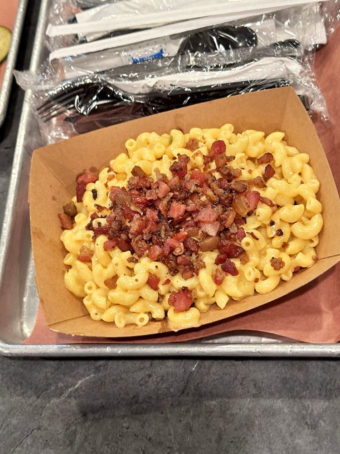 Mac and cheese with bacon bits—because sometimes perfection can actually be improved upon. Comfort food that hugs your soul from the inside.