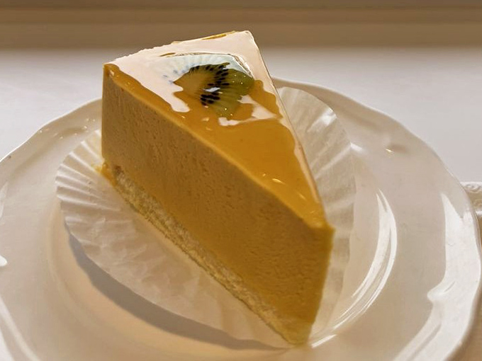 This mango mousse cake doesn't just melt in your mouth—it performs a full symphony of flavor while doing so.
