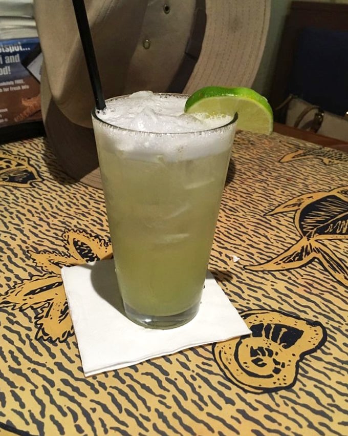 A margarita with the perfect salt rim and lime garnish—because sometimes the ideal seafood companion isn't wine but a citrusy cocktail that means business.