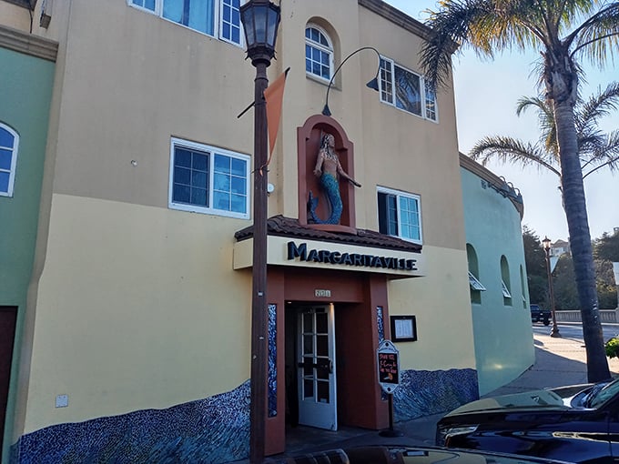 Margaritaville's mermaid watches over Capitola Village, ensuring no one takes life too seriously when there are frozen drinks to enjoy.