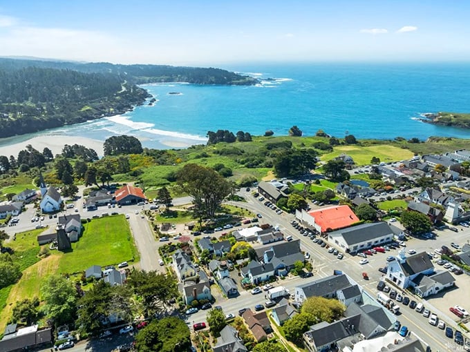 From above, Mendocino reveals its perfect positioning—a village that found the sweet spot between forest and sea, refusing to choose between the two.