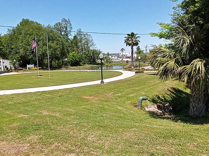 Orman House's manicured grounds and walking paths offer peaceful moments of reflection under Florida's impossibly blue skies.