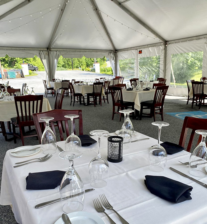 The outdoor dining tent transforms ordinary parking into an al fresco paradise—proof that great food tastes even better with fresh air.