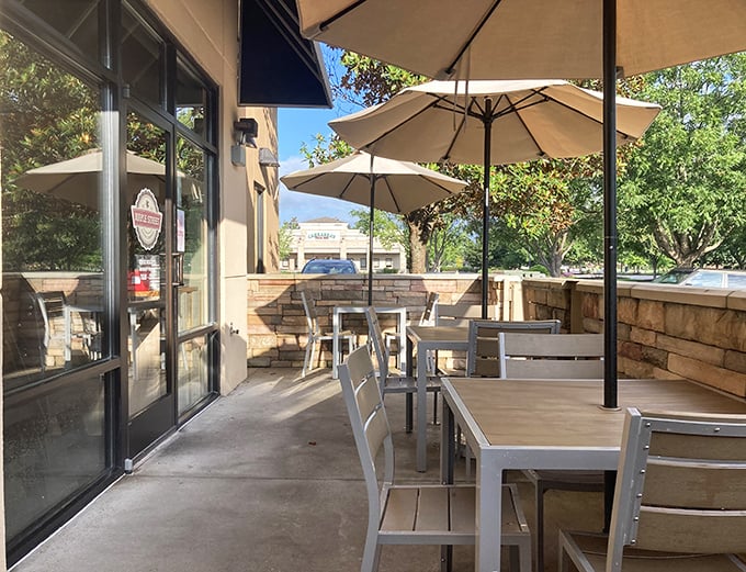 Al fresco dining perfection where Southern sunshine meets exceptional biscuits in perfect outdoor breakfast harmony.
