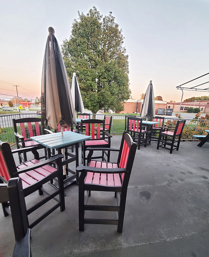 The outdoor seating area offers fresh air and colorful chairs—perfect for enjoying a shake while watching the world go by.