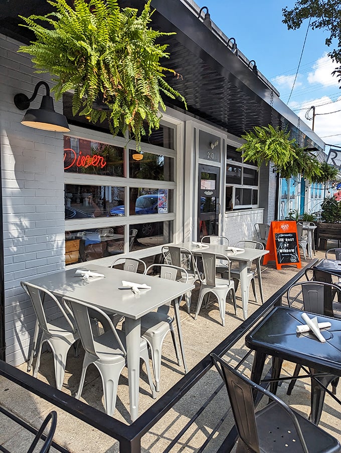 The outdoor seating area offers a breath of fresh air with your meal. Those hanging ferns create a garden-like atmosphere right on Milford's main drag.