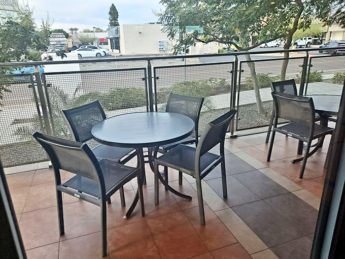 Outdoor seating for those who prefer their pastrami with a side of people-watching. Arizona's weather and Miracle Mile's sandwiches – a match made in heaven.
