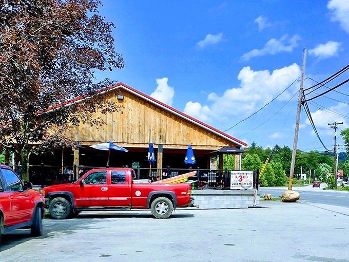 Blue skies, wooden beams, and picnic tables—sometimes the best dining rooms don't have walls at all.