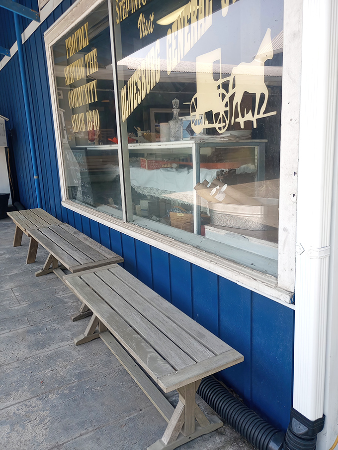 Simple wooden benches outside the blue-painted storefront offer a place to savor your sandwich while contemplating life's important questions—like ordering seconds.