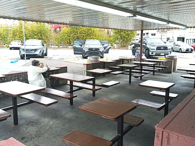 The outdoor seating area—simple, utilitarian, and perfect for the serious business of devouring mountains of pastrami.