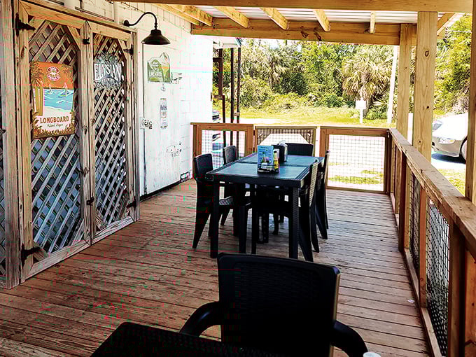 The rustic deck offers a peaceful spot to savor your seafood while surrounded by the natural Florida landscape that produced it.