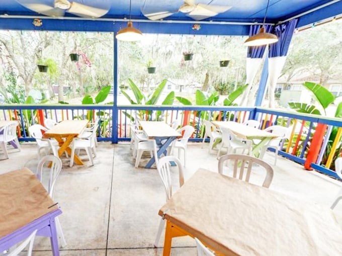The colorful outdoor seating area feels like dining in a tropical garden—where Florida's natural beauty complements its culinary treasures.