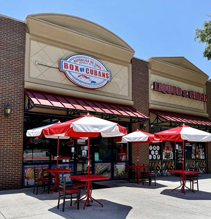 Outdoor seating under red and white umbrellas—because sometimes sandwiches this good deserve to be enjoyed with a side of sunshine and people-watching.