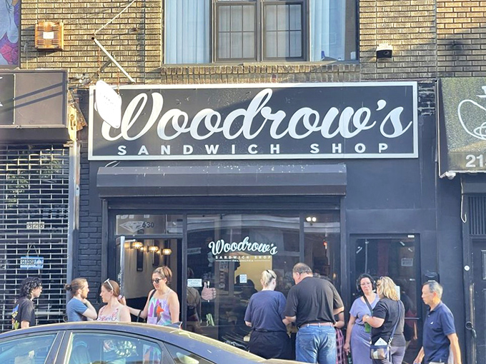 The crowd outside isn't just hungry—they're believers in the gospel of great sandwiches, willing to wait for their moment of culinary salvation.