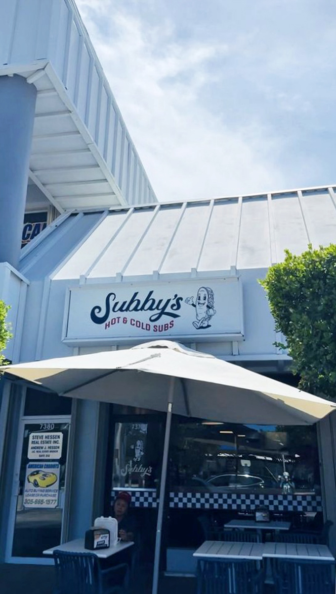 A slice of sandwich paradise under the Florida sky. That umbrella isn't just providing shade—it's marking a culinary treasure spot.