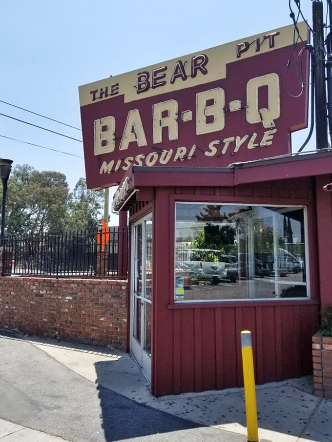 That sign isn't just advertising—it's a beacon for the barbecue faithful. A landmark that's guided hungry pilgrims for generations.