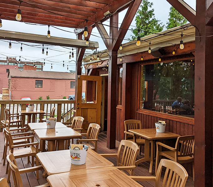 The outdoor deck – where fresh air, string lights, and wooden beams create the perfect setting for savoring burgers while soaking up Milwaukee's precious summer days.