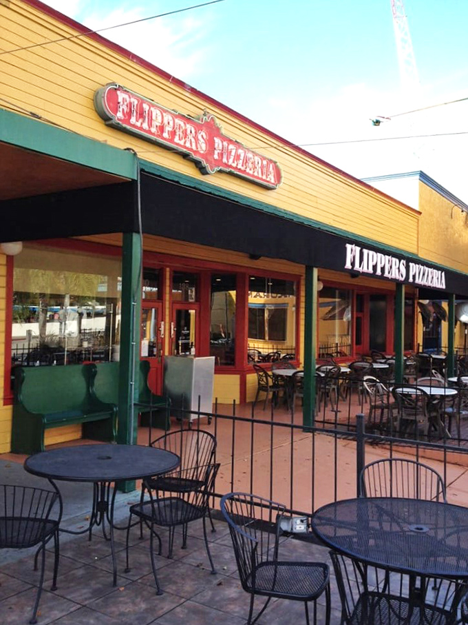 The outdoor patio at Flippers—where Florida's balmy evenings and perfect pizza slices create the ideal setting for laid-back dining.