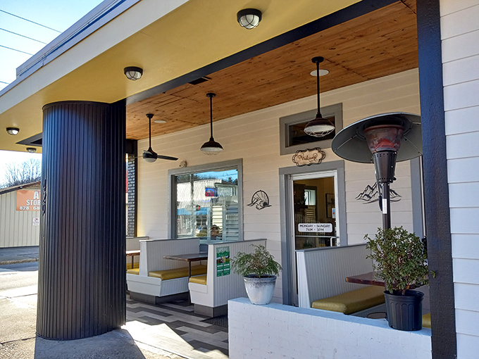 Even the outdoor seating area says "mountain charm with a side of comfort"—the perfect appetizer before you step inside for the main event.